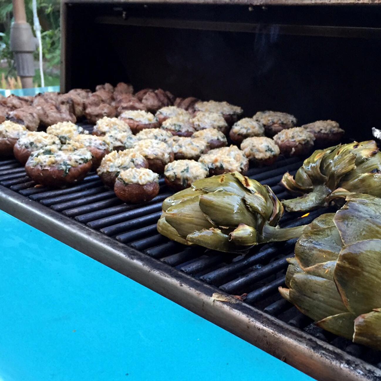 Rockwell By Caliber 60-Inch Propane Gas Grill On Wood Table - Turquoise ...